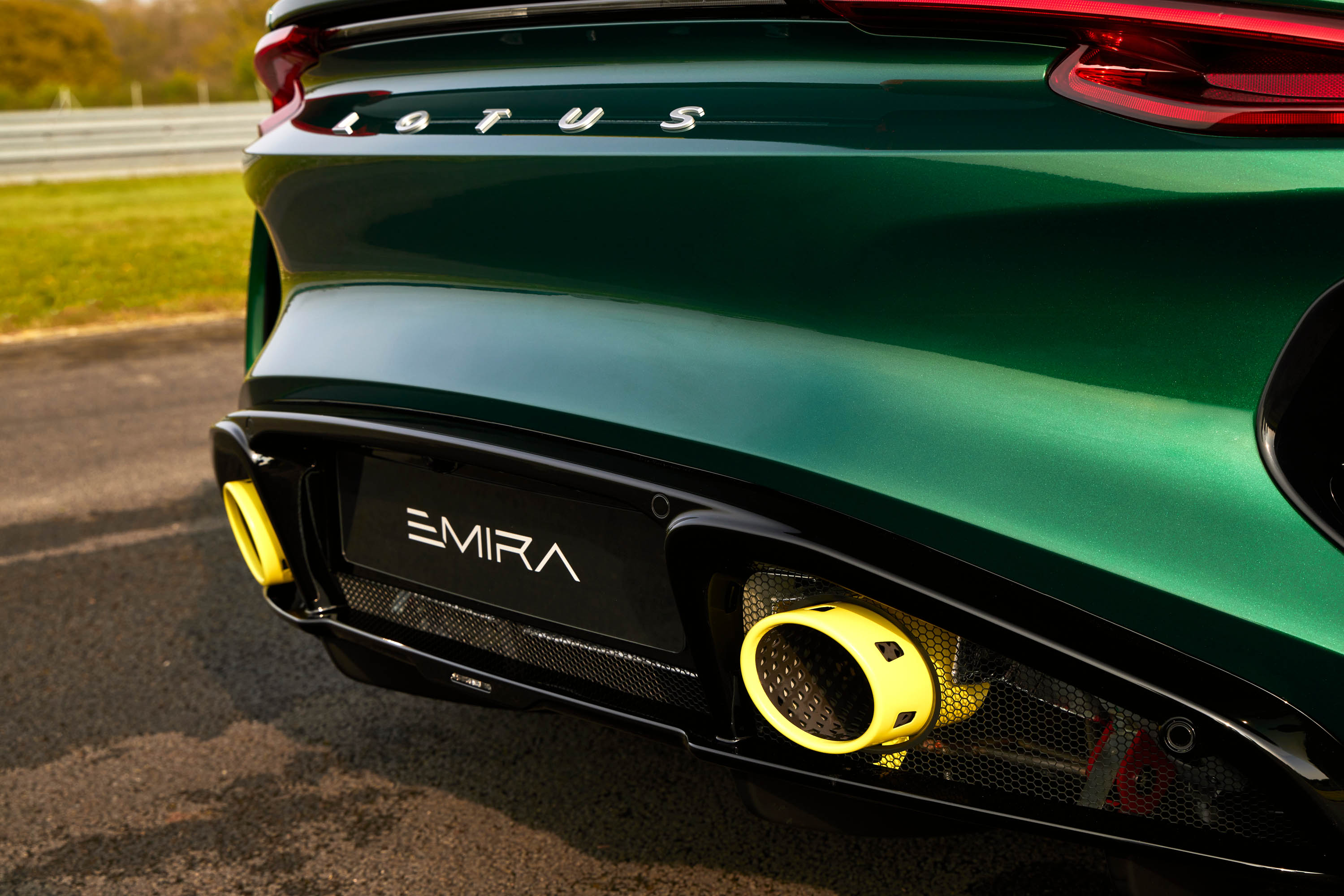 Acquire | Lotus-Emira-Clark-Edition-Exterior-Hethel-Yellow-pipes